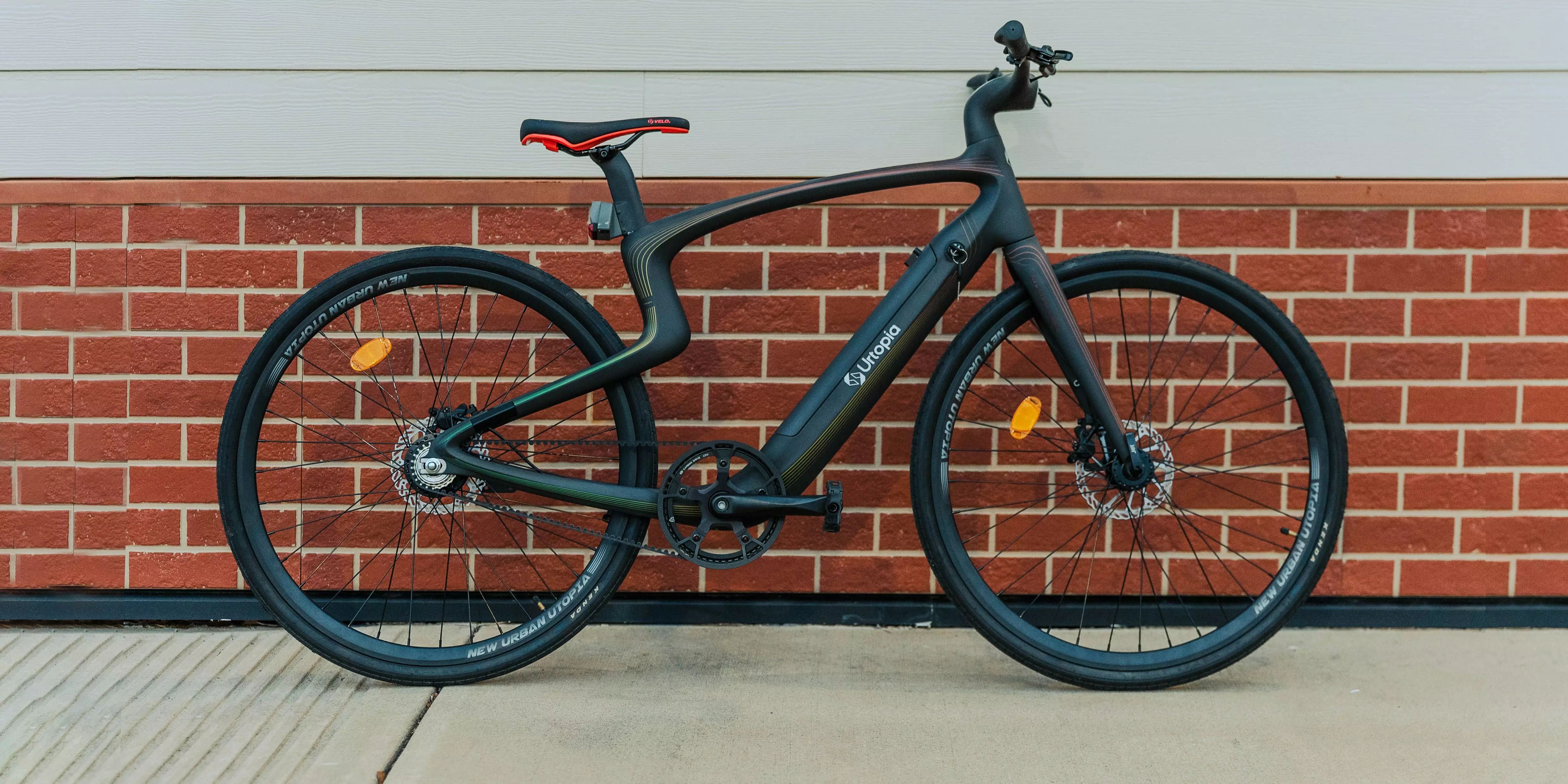 Urtopia: Lub Ultra-Lightweight Carbon Fiber Ntse E-Bike ntawm lub neej yav tom ntej